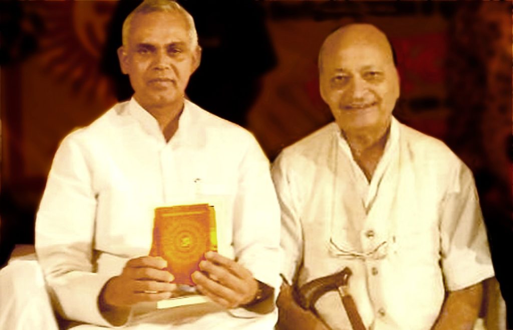 Governor of Himachal Pradesh Acharya Dev Vrat showing Sri V.P.S.Rao’s “Om Mahima” to the ...